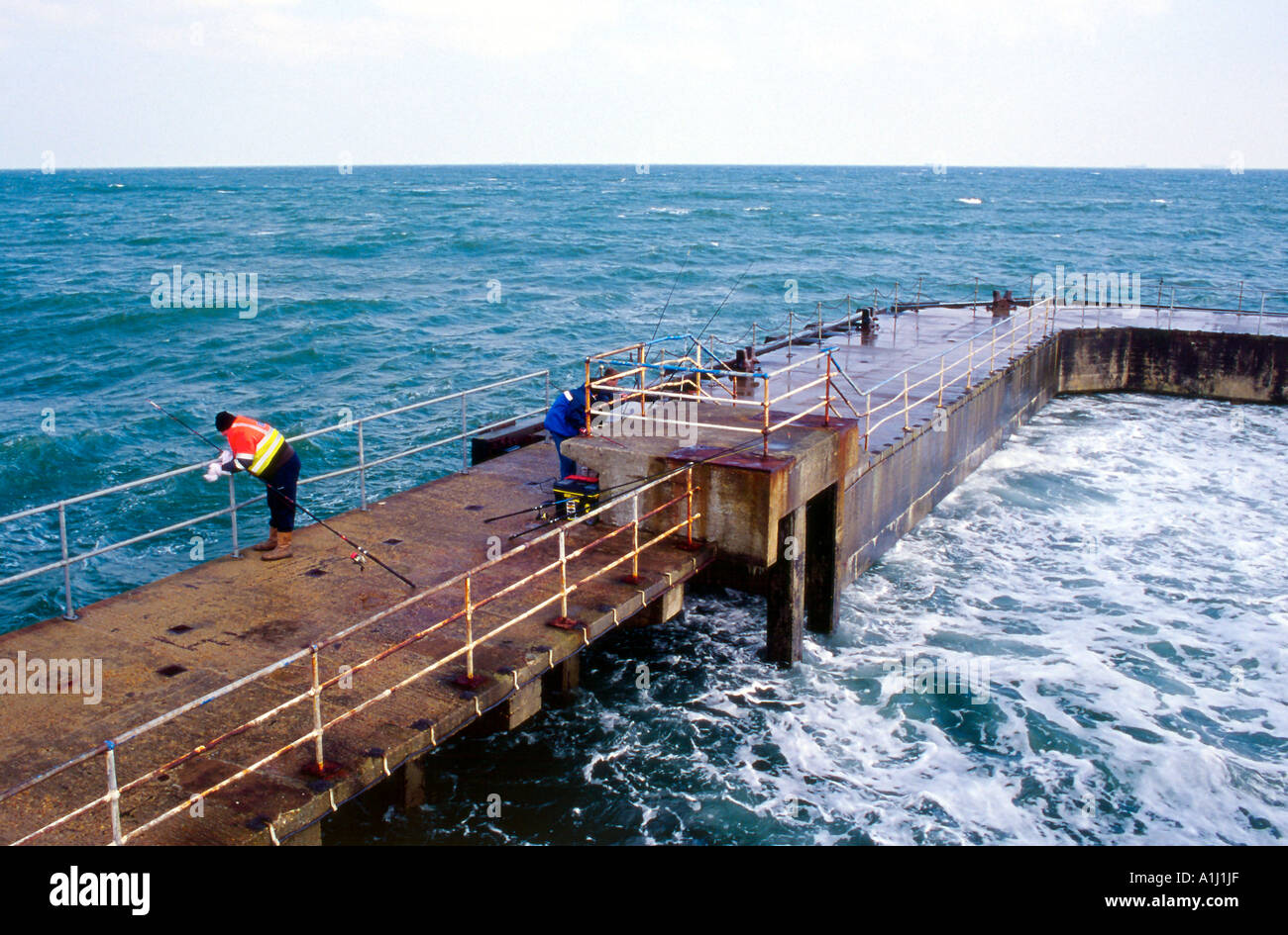 Fishing in turbulent sea hi-res stock photography and images - Alamy