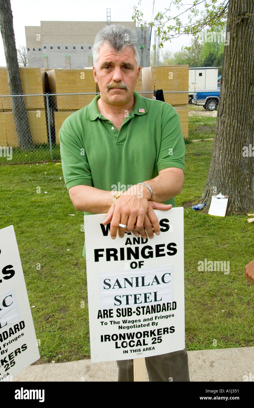 Male union workers on strike on construction project for better wages ...
