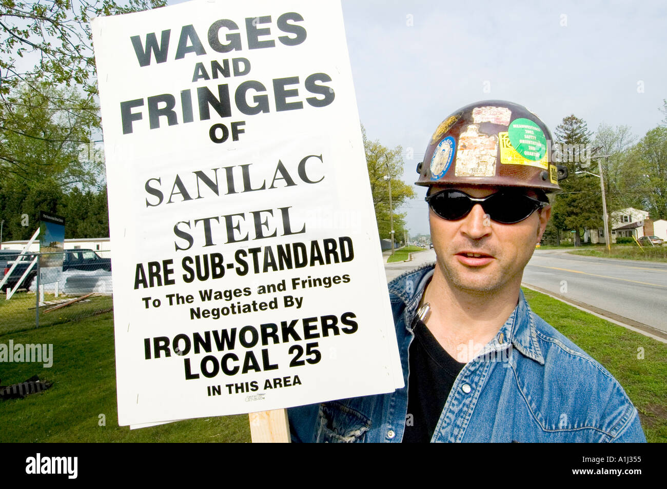 Male union workers on strike on construction project for better wages ...