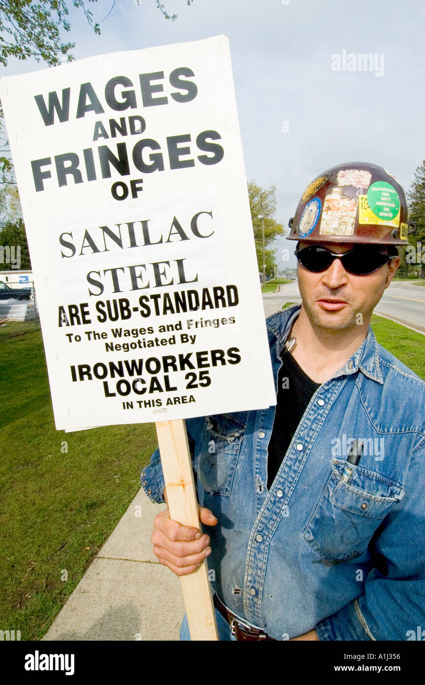 Male union workers on strike on construction project for better wages ...