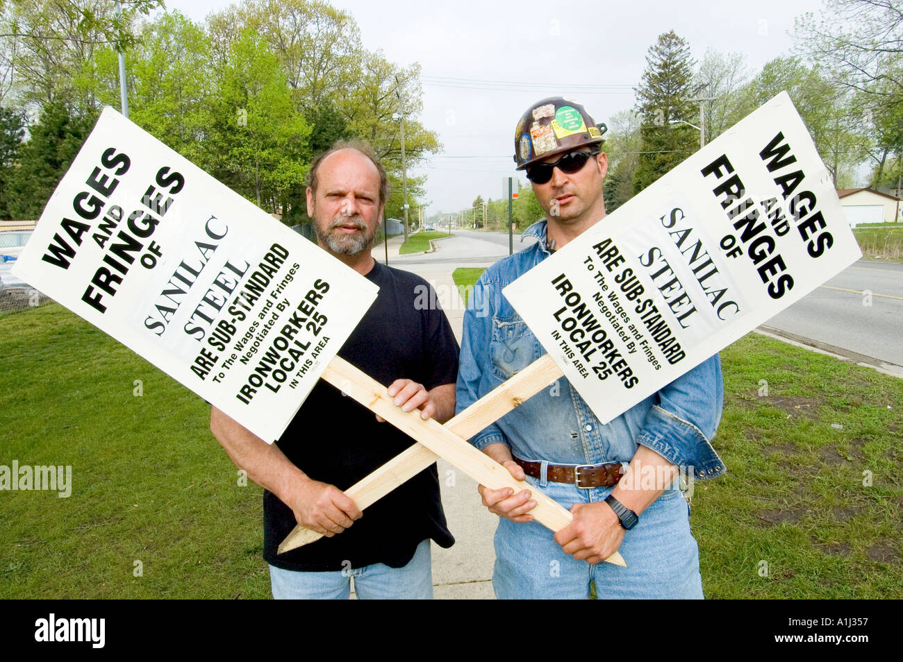 Male union workers on strike on construction project for better wages ...