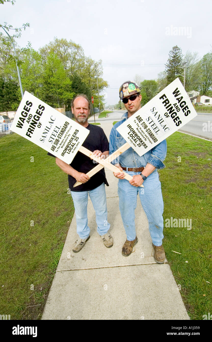 Male union workers on strike on construction project for better wages ...