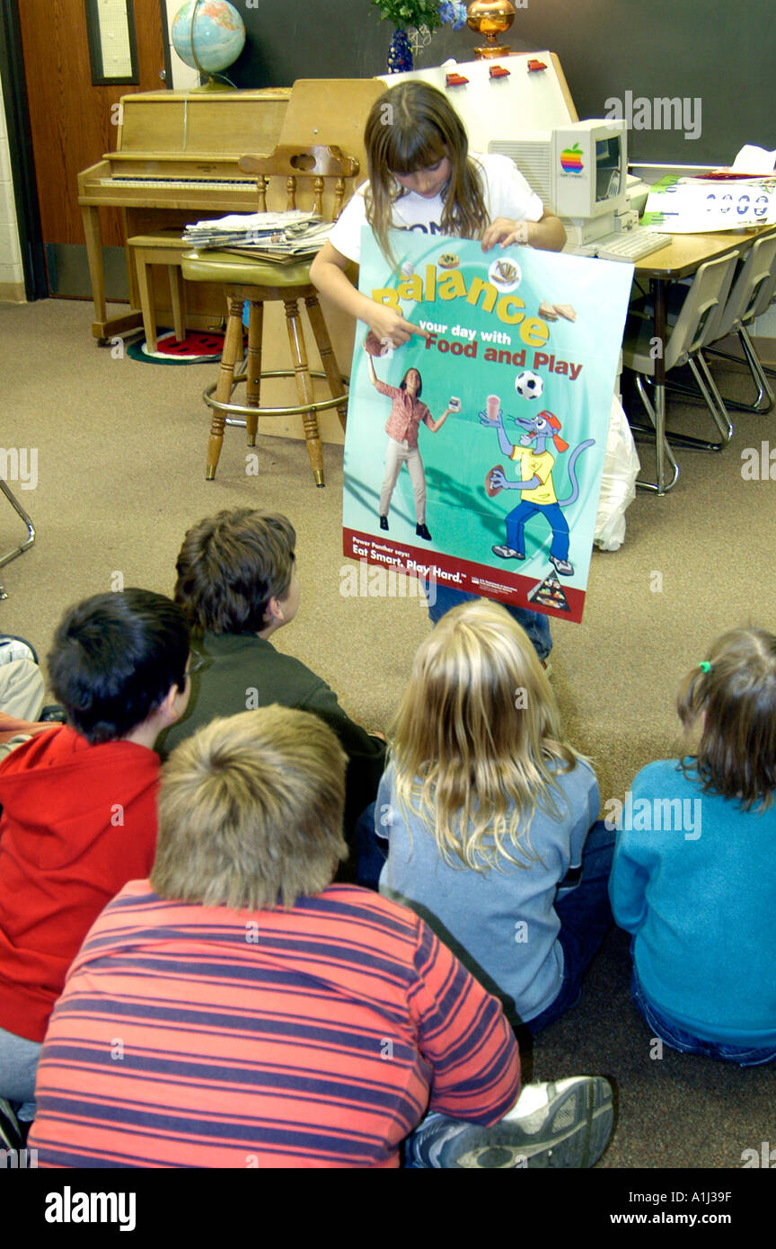 3rd Grade Elementary Students Learn to Give Group Presentations Stock ...