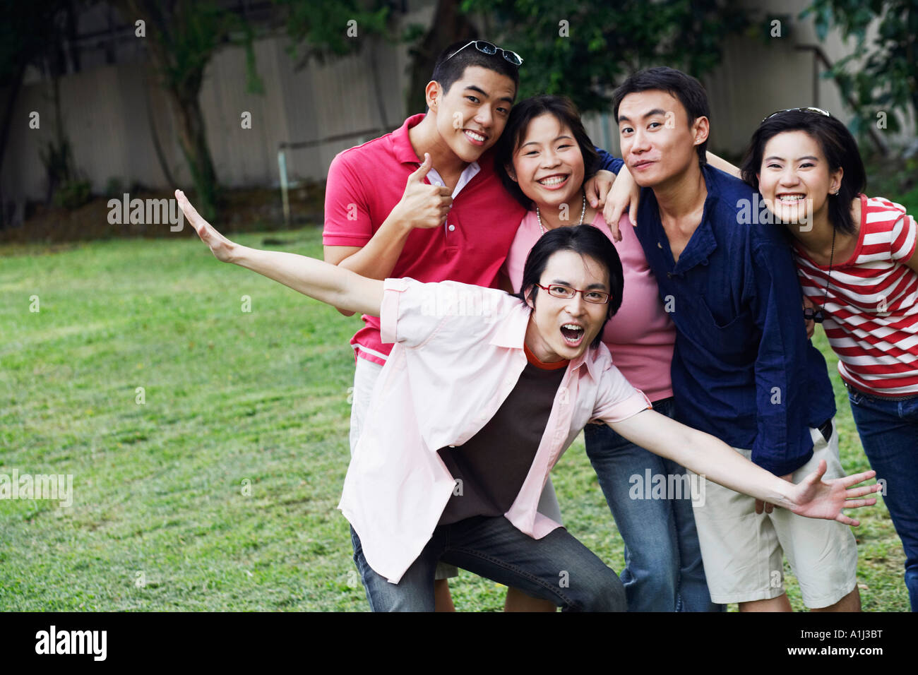 Portrait of five people looking cheerful Stock Photo - Alamy