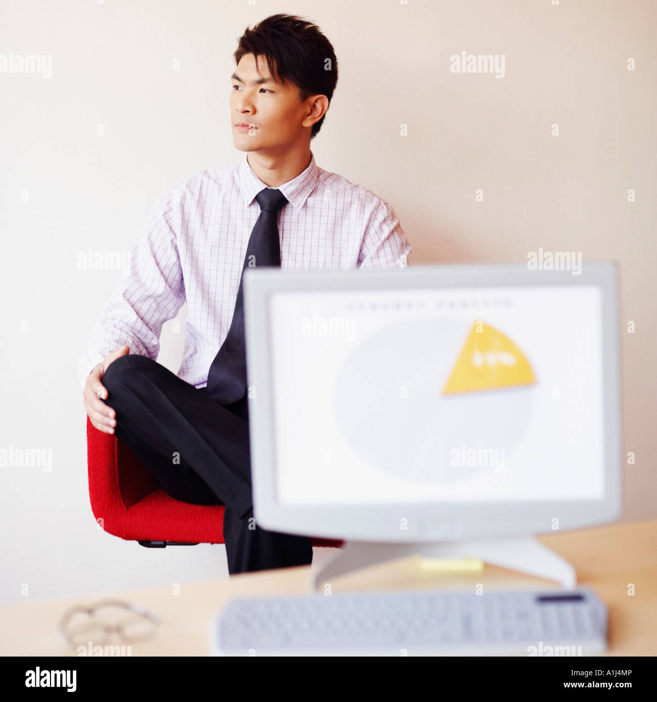 Sitting in front of computer monitor hi-res stock photography and ...