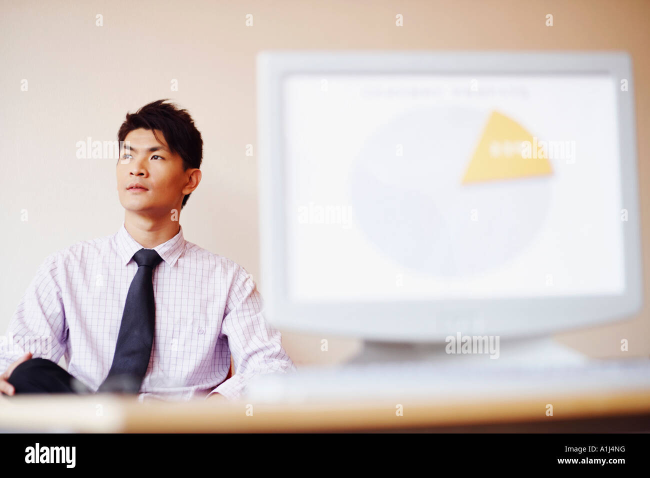 Sitting in front of computer monitor hi-res stock photography and ...