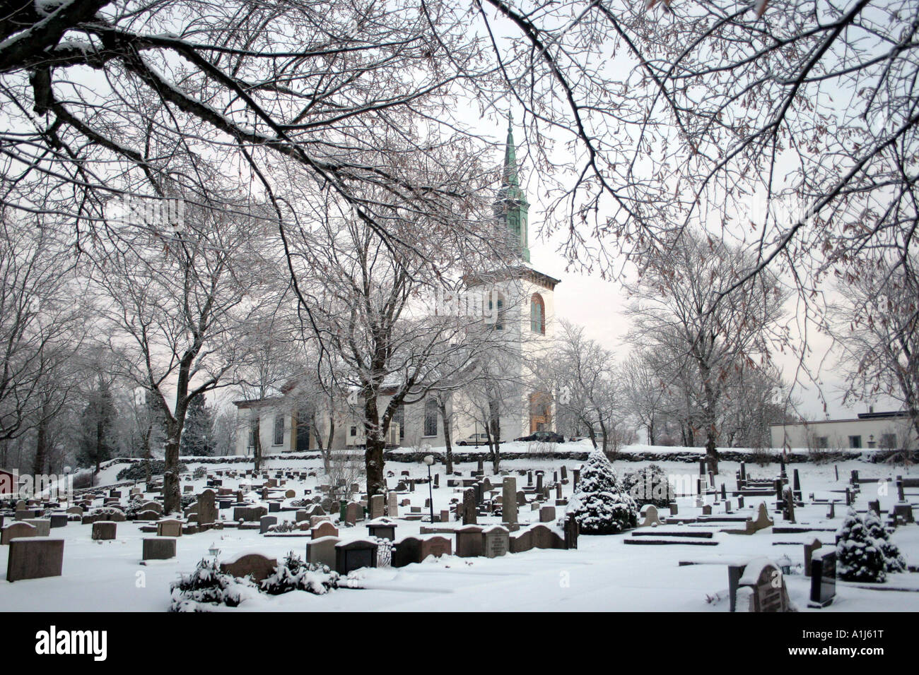 Church graveyard in snow Stock Photo - Alamy