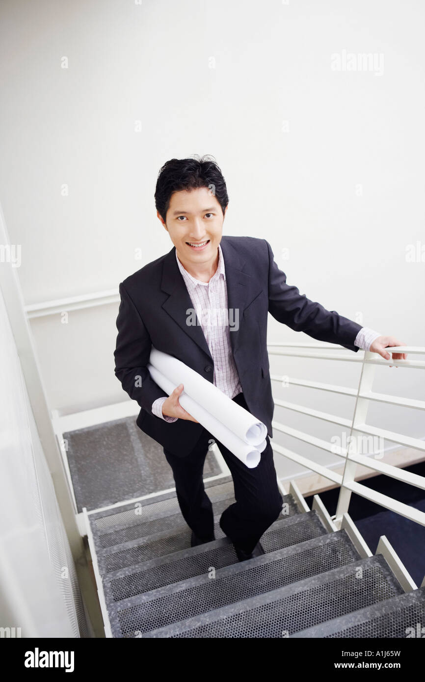 Black man walking up stairs hi-res stock photography and images - Alamy