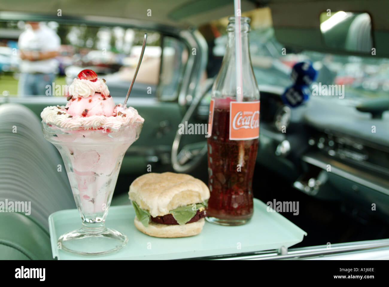 drive in restaurant tray hanging on the window of a 1950 s america car ...