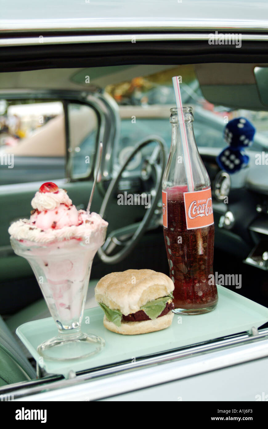 drive in restaurant tray hanging on the window of a 1950 s america car ...