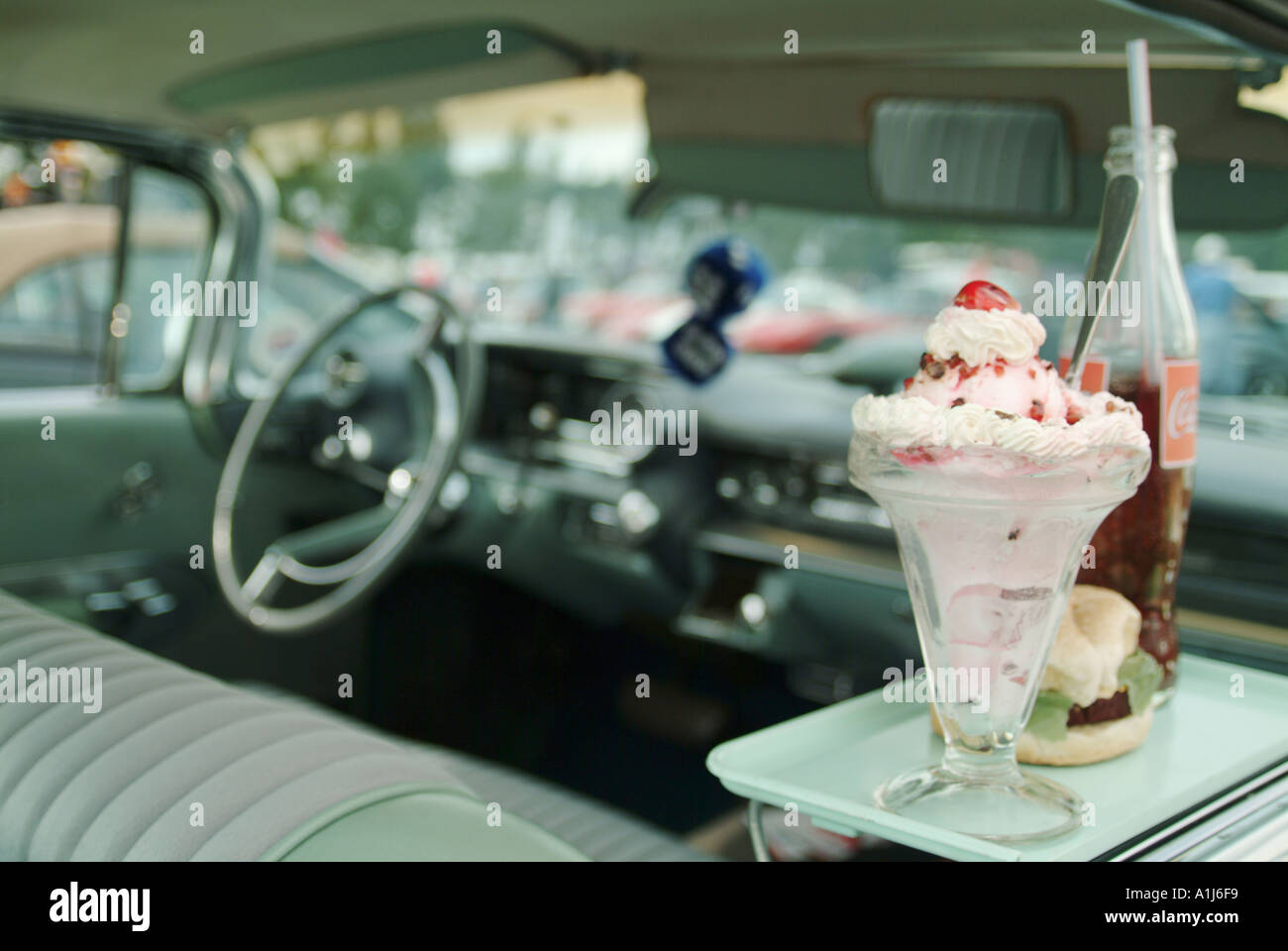 drive in restaurant tray hanging on the window of a 1950 s america car ...
