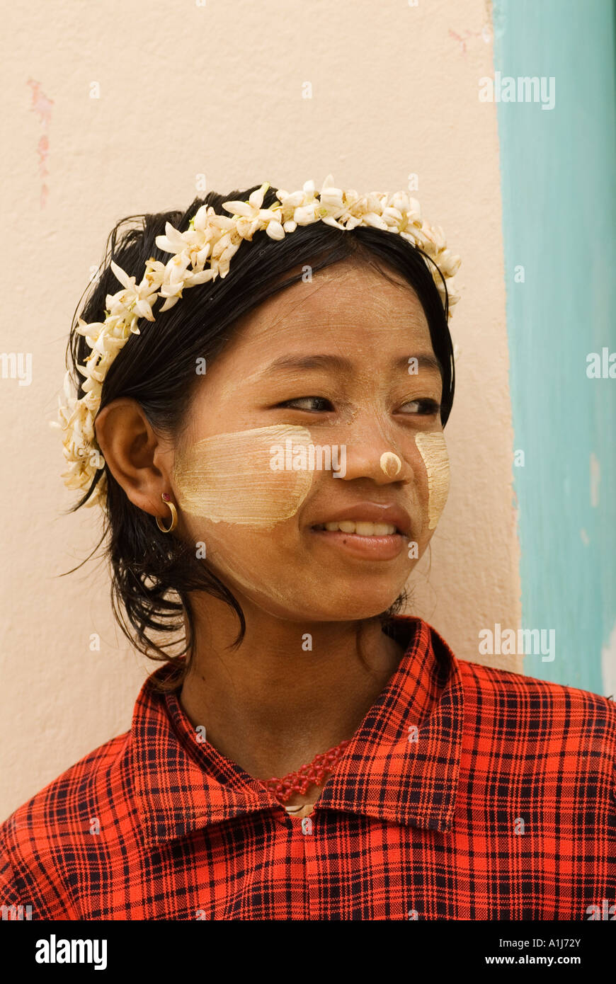 Young girl wearing traditional make up called thanakha Myanmar Burma ...