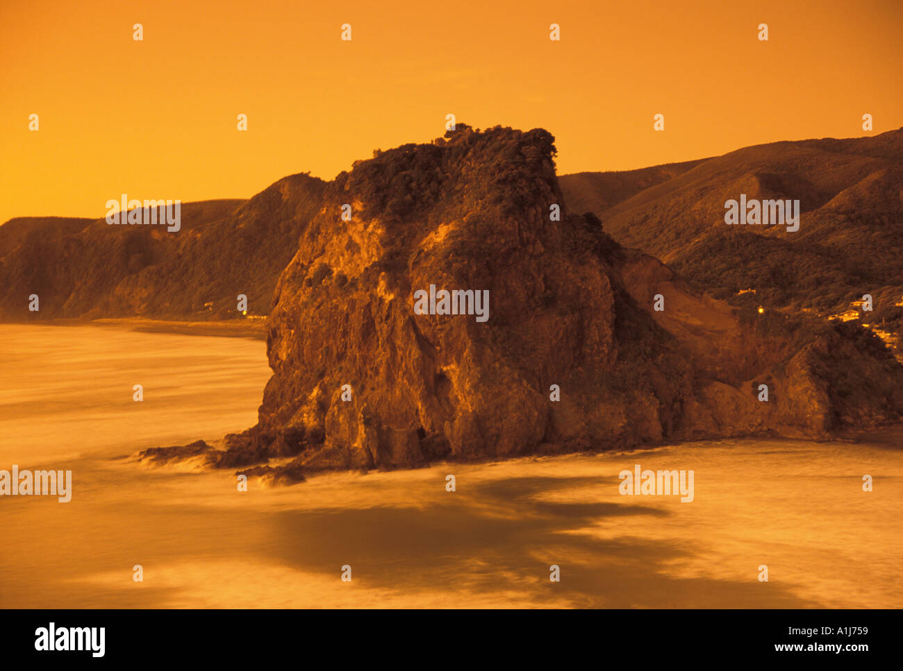 Piha Beach Lions Rock New Zealand Stock Photo - Alamy