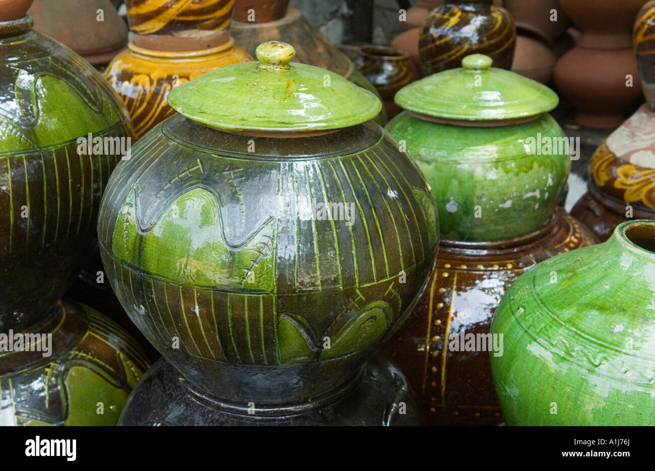 Mandalay colourful traditional domestic pottery on sale at the side of ...