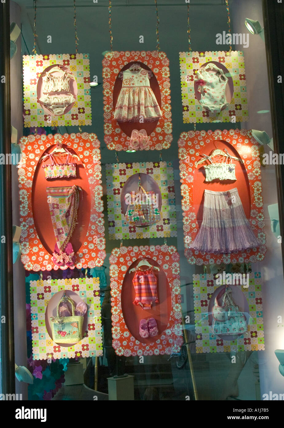 Colourful window display at Monsoon store High Street Kensington London ...
