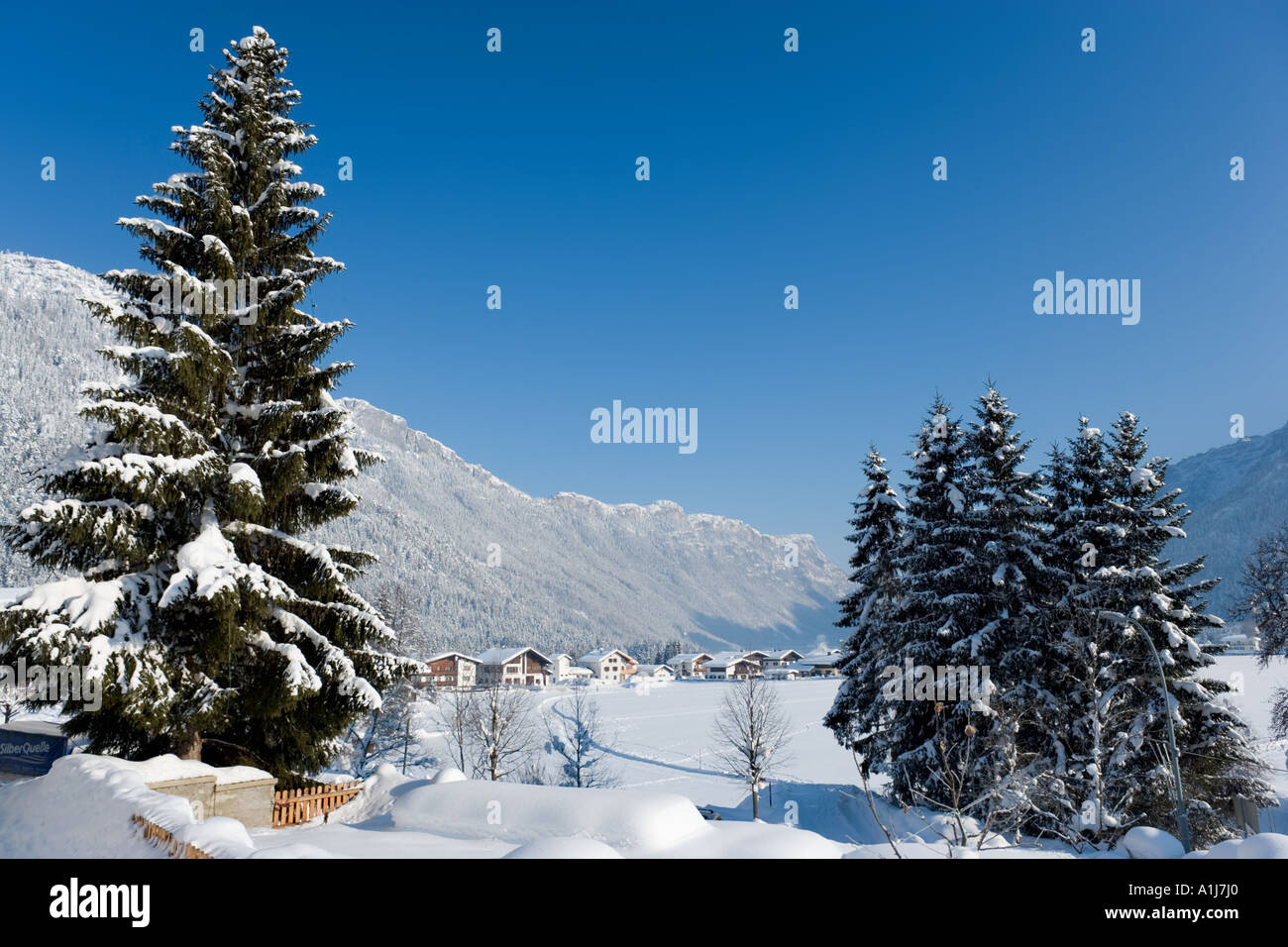 View from the village centre after a heavy snowfall, Waidring ...