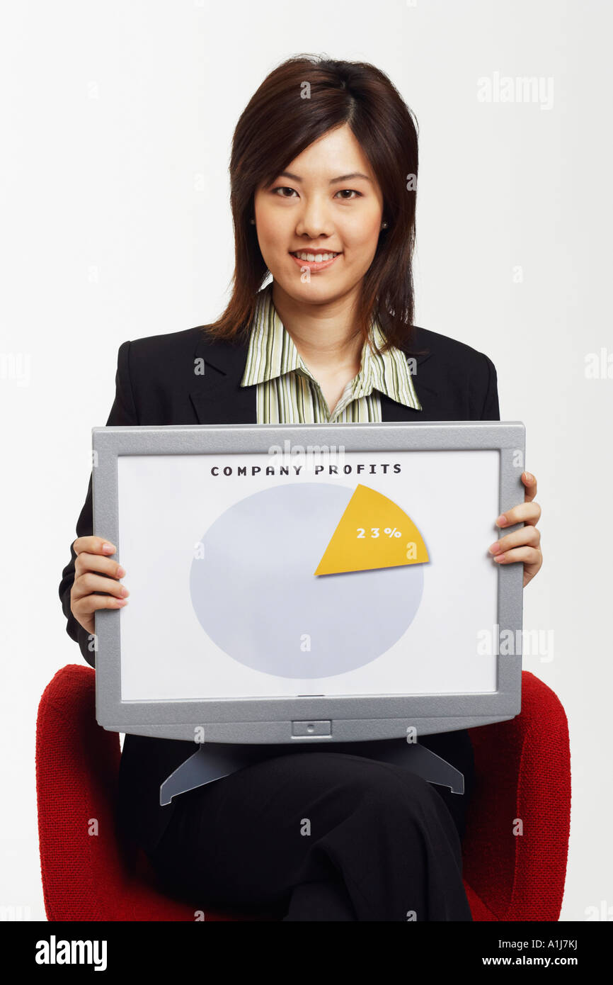 Portrait of a businesswoman sitting on a chair and holding a progress ...