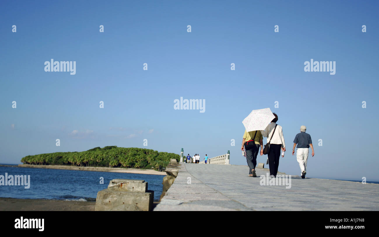 People walking alongside Aoshima beach, Aoshima, Miyazaki, Kyushu ...