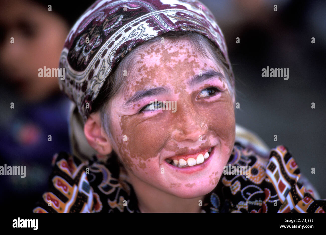 Young Uzbek child in traditional costume, Samarkand, Uzbekistan ...