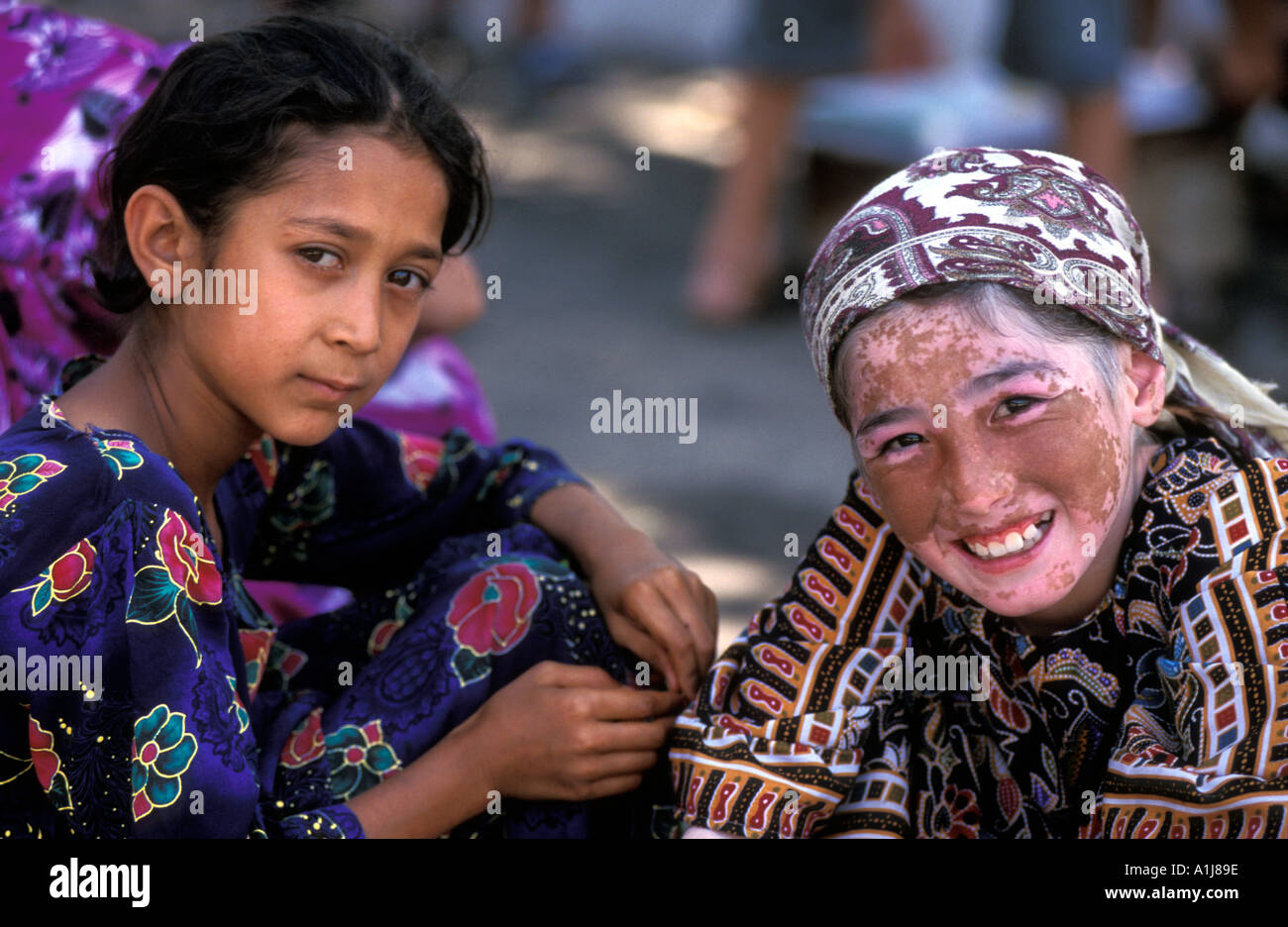 Two Uzbek children in traditional costume Samarkand Uzbekistan Stock ...