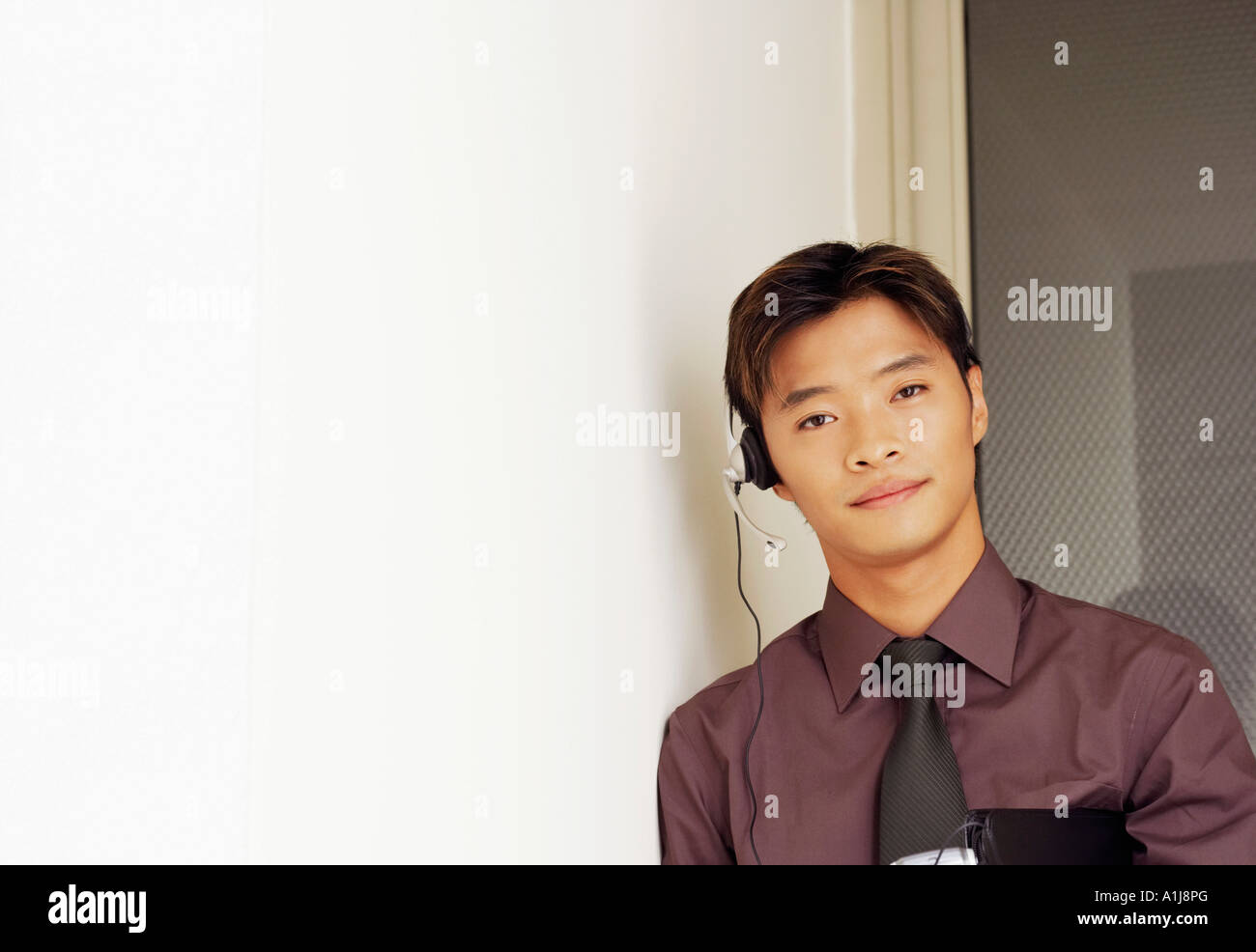Portrait of customer service person with head phones hi-res stock ...