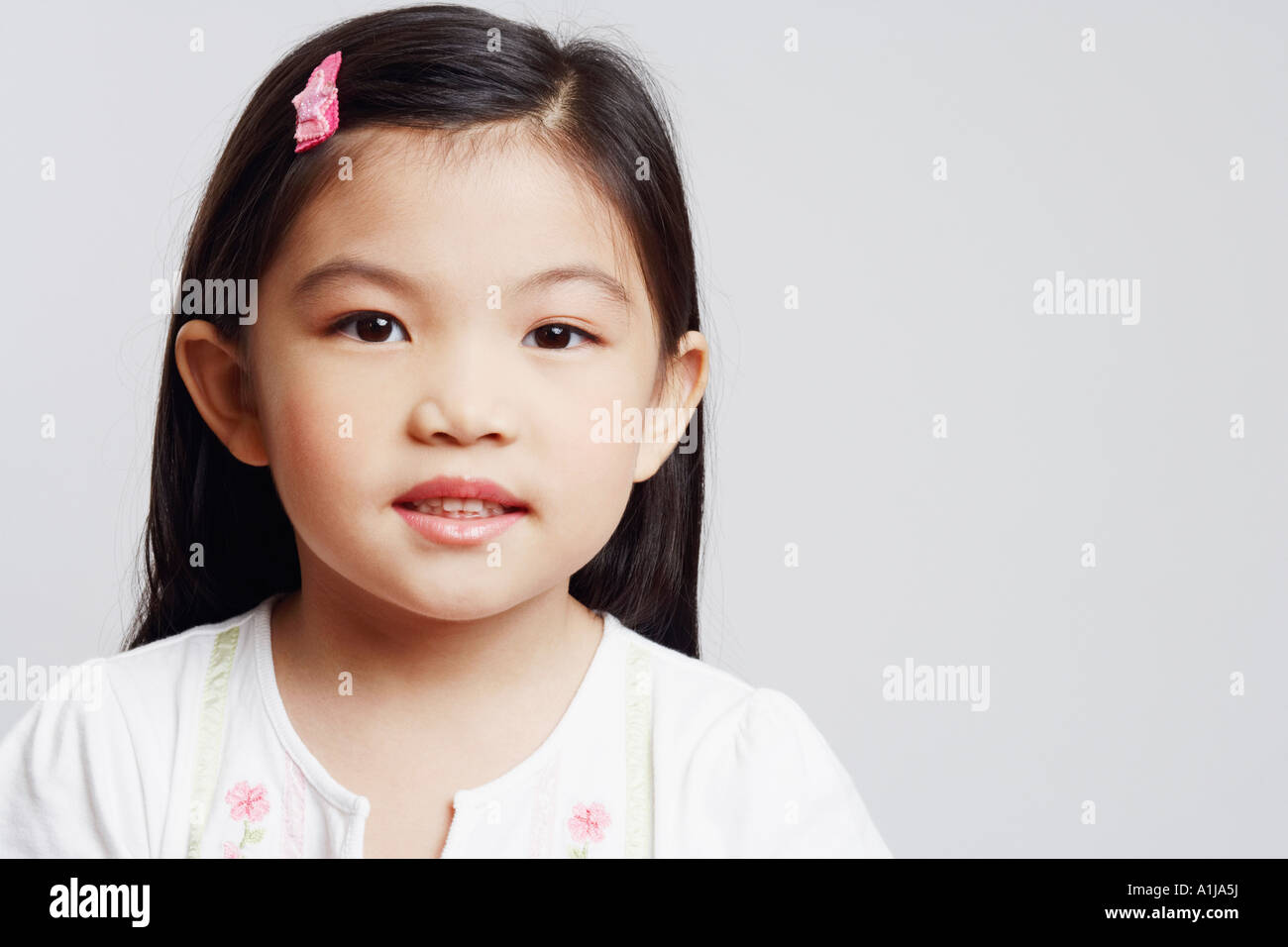 Portrait of a girl smiling Stock Photo - Alamy