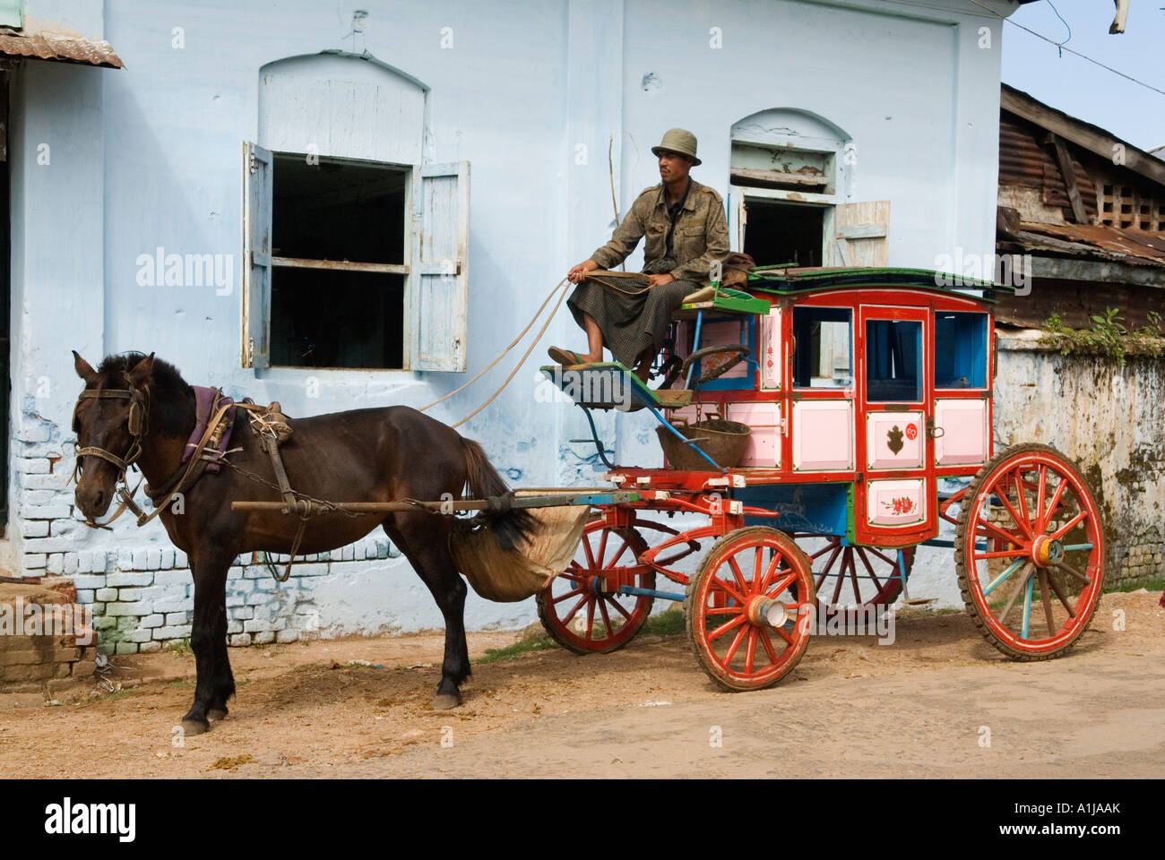 Horse and carriage on a small road hi-res stock photography and images ...