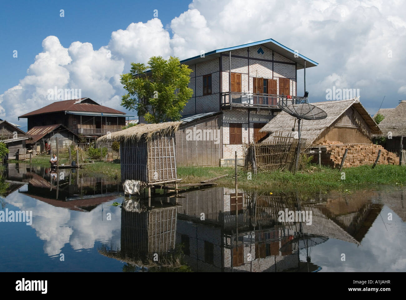 Inle Lake Myanmar Burma . Brick built house and satalite dish home to a ...