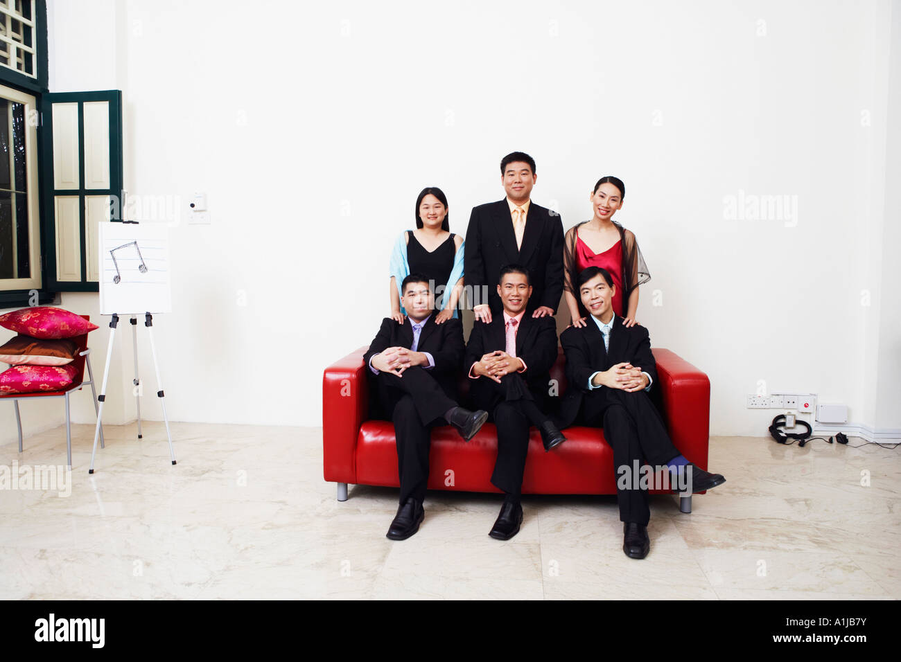 Portrait of a group of business executives posing Stock Photo - Alamy