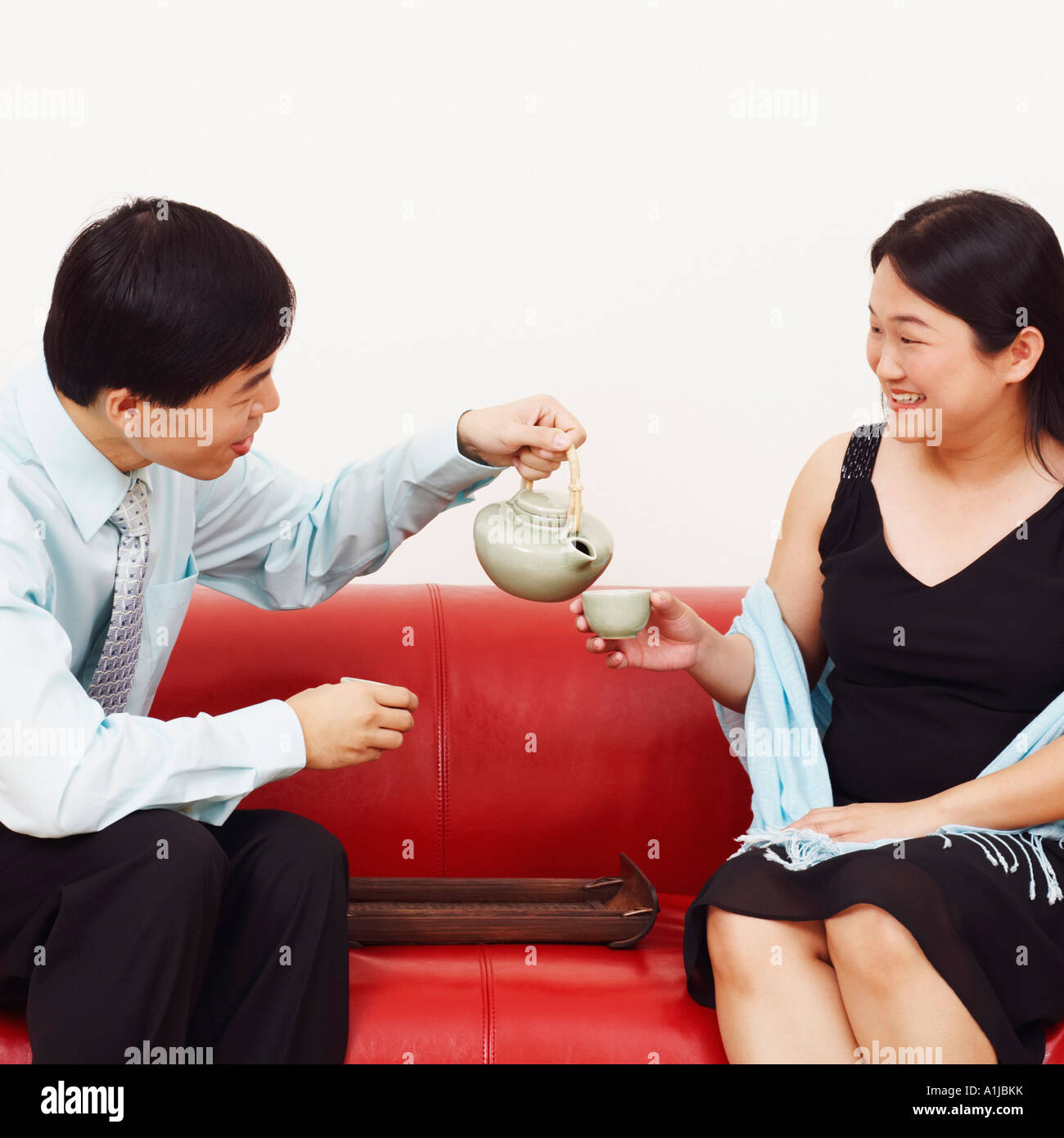 Cheerful man tea kettle hi-res stock photography and images - Alamy