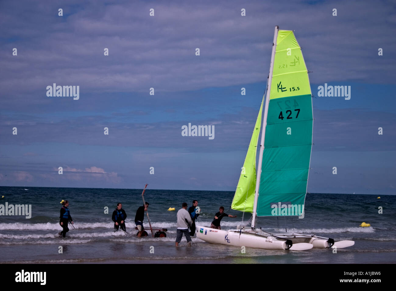 Sailboat being launched Stock Photo - Alamy