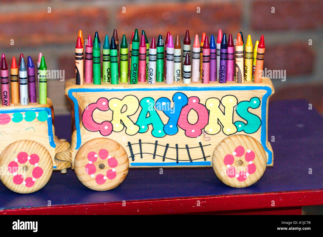 Colourful wooden toy train hi-res stock photography and images - Alamy