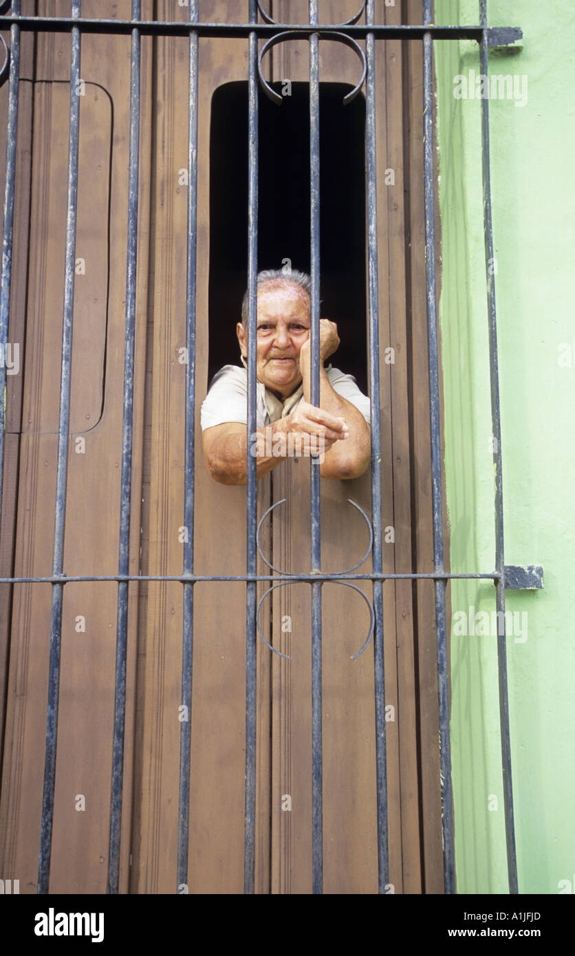 Old man hanging out of a window behind bars Stock Photo - Alamy Old man hanging out of a window behind bars Stock Photo - Alamy