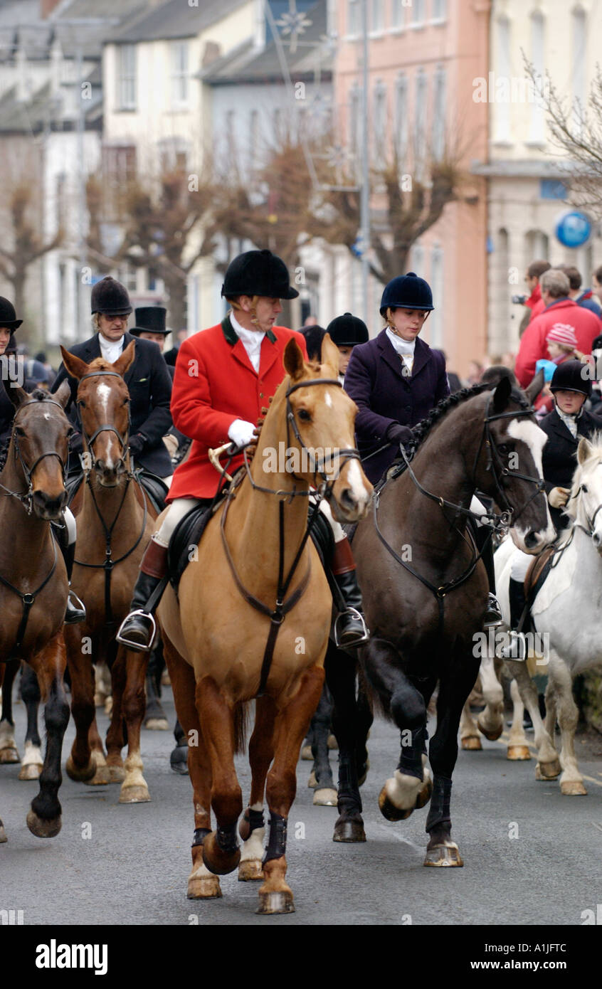 Huntsman in red coat on horseback with followers gather for fox hunt ...
