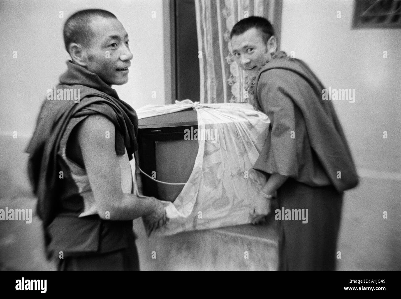 Running monks Black and White Stock Photos & Images - Alamy
