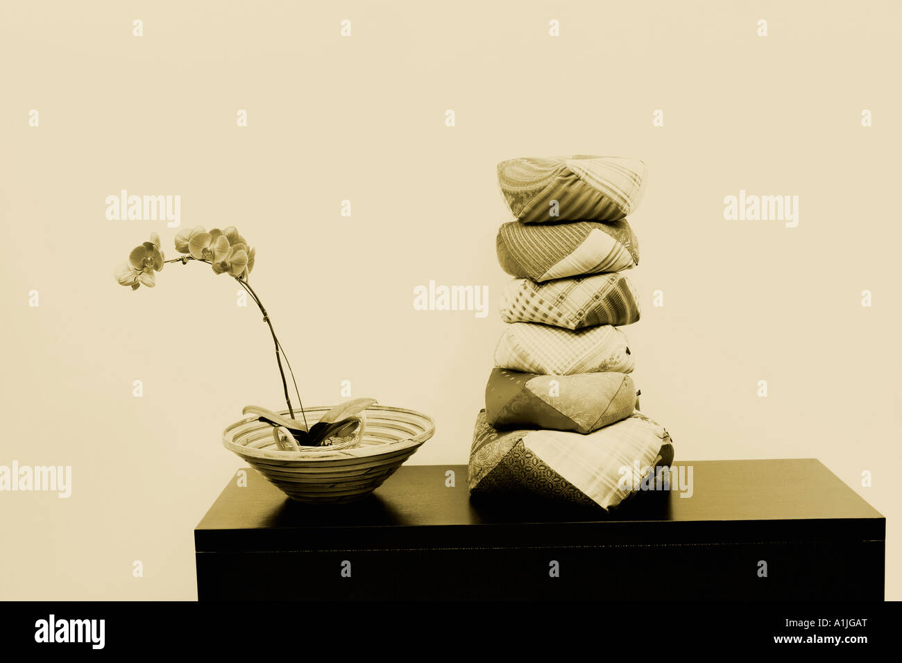 Stack of cushions on a cabinet Stock Photo - Alamy