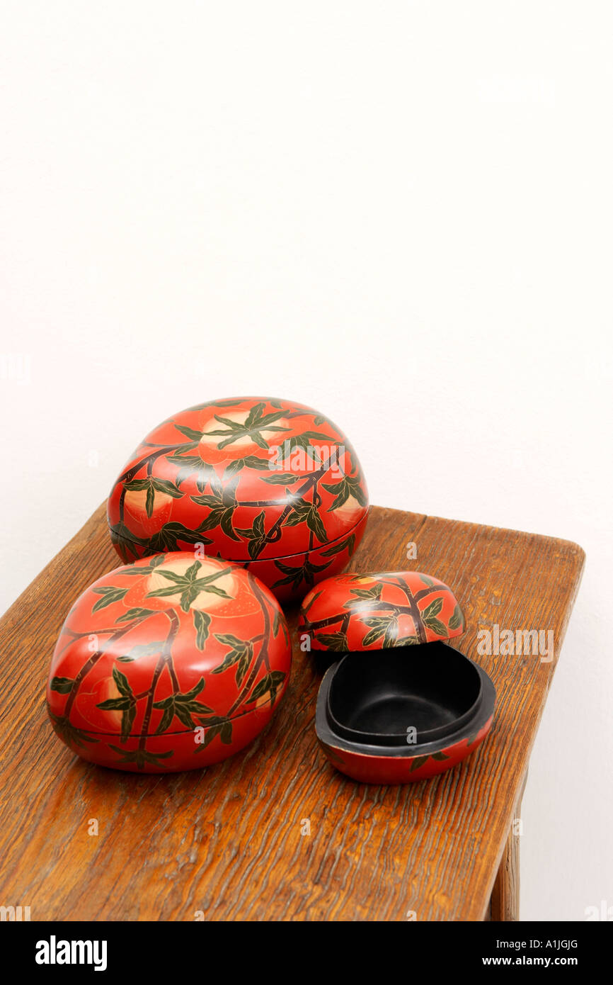 Close-up of three boxes on a desk Stock Photo - Alamy