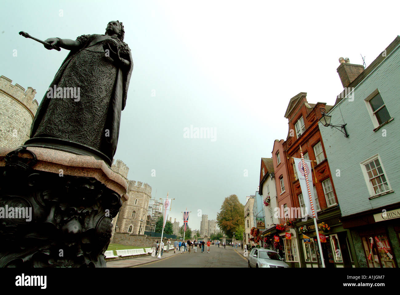 The Statue of Queen Victoria Windsor England with Windsor Castle in the ...