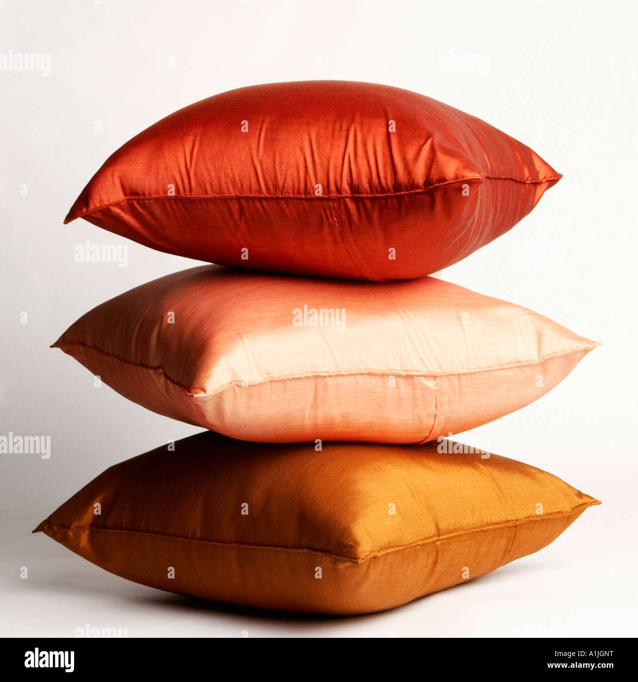 Close-up of a stack of cushions Stock Photo - Alamy