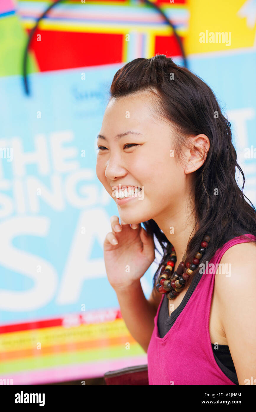 Side profile of a young woman smiling Stock Photo - Alamy