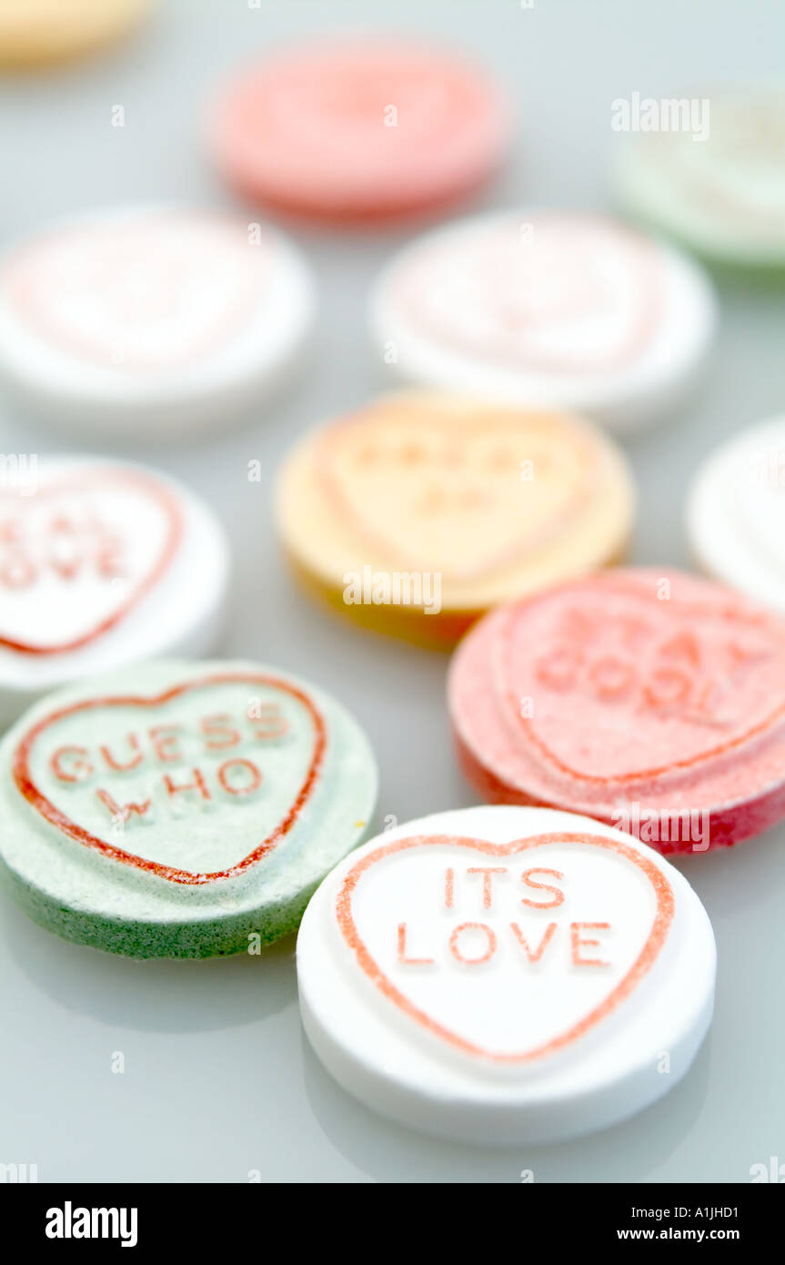 Valentine's Day candies with love messages Stock Photo - Alamy