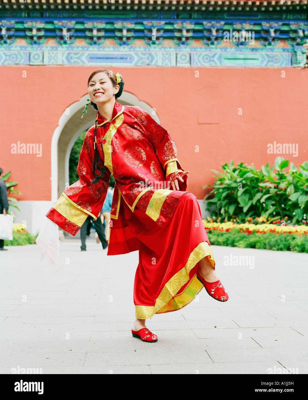 Portrait of a young woman dancing in the traditional clothing Stock ...