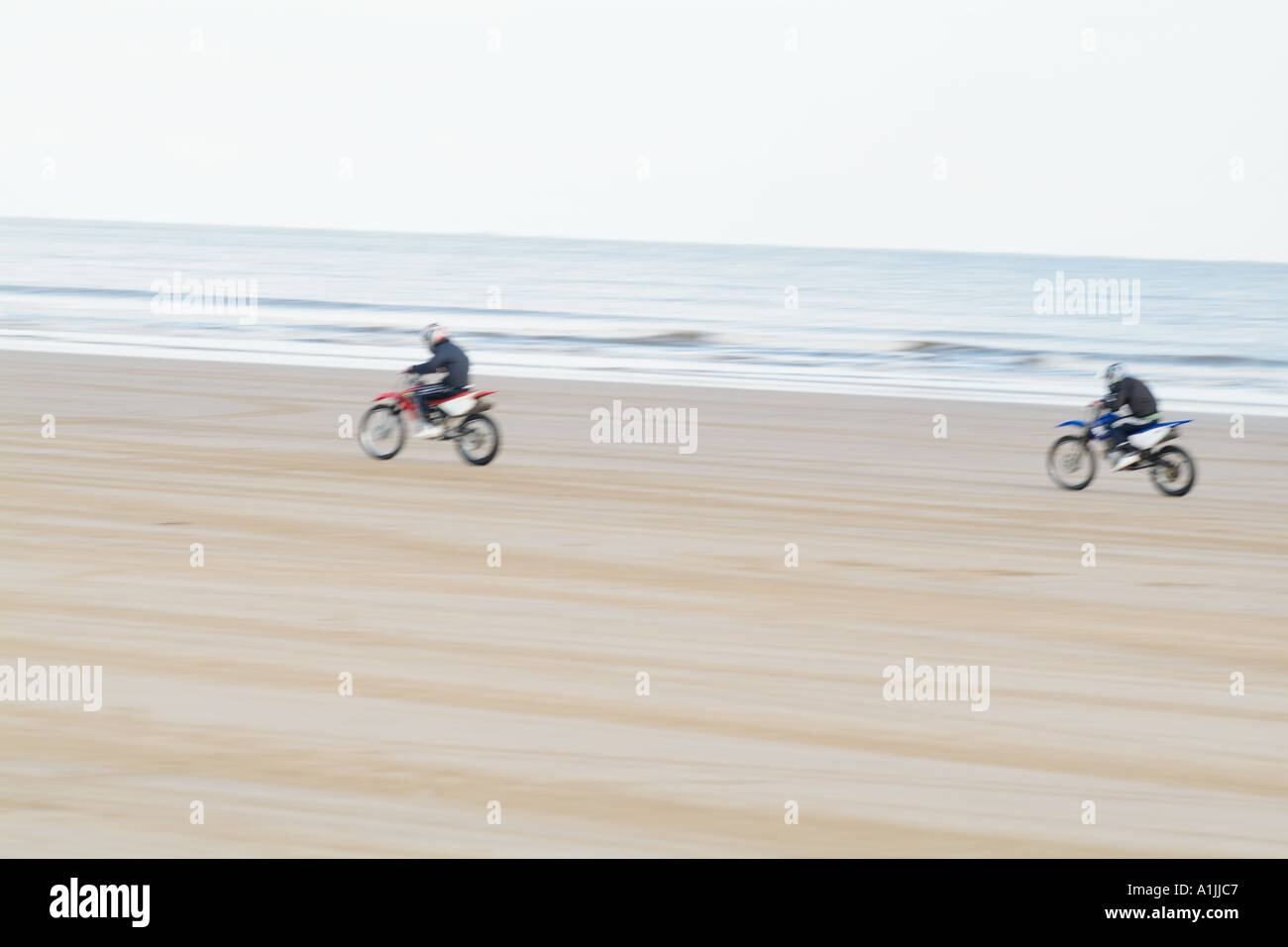 moto x motor cross motorcross motocross motoX bikes at speed on beach ...