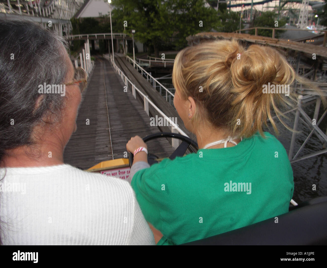 Grandmother riding with Granddaughter Stock Photo - Alamy