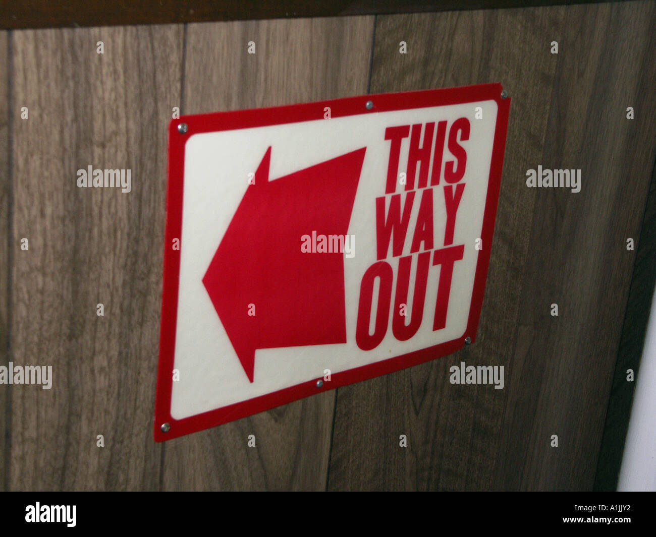 This Way Out Sign Stock Photo - Alamy