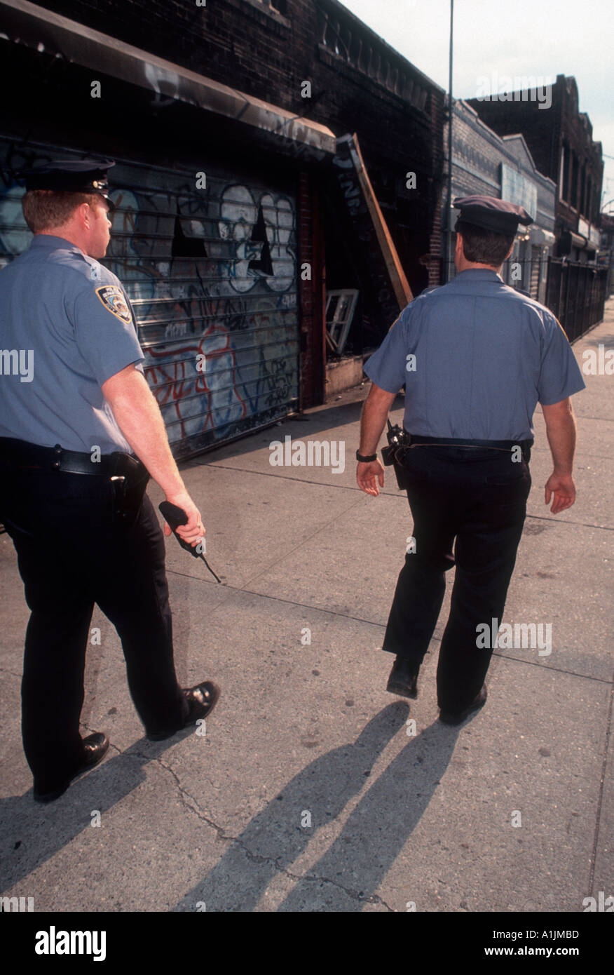 Police officers walk the beat in the 75th precinct in Brooklyn in the ...
