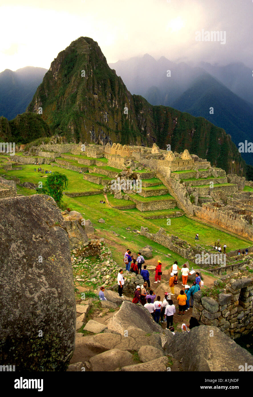 people tourists visiting Machu Picchu aka The Lost City of the Incas an ...