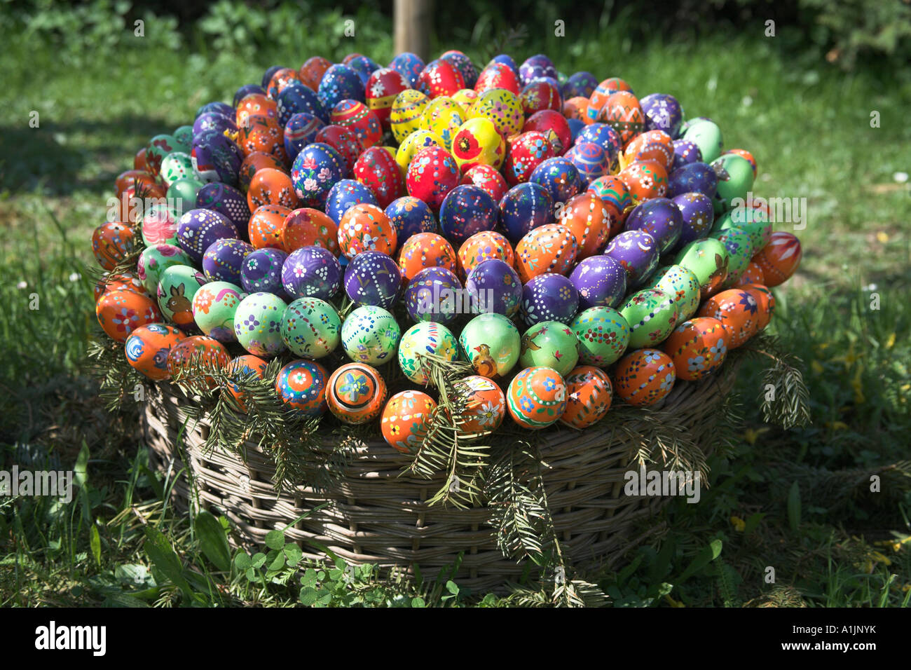 basket filled with easter eggs Stock Photo - Alamy
