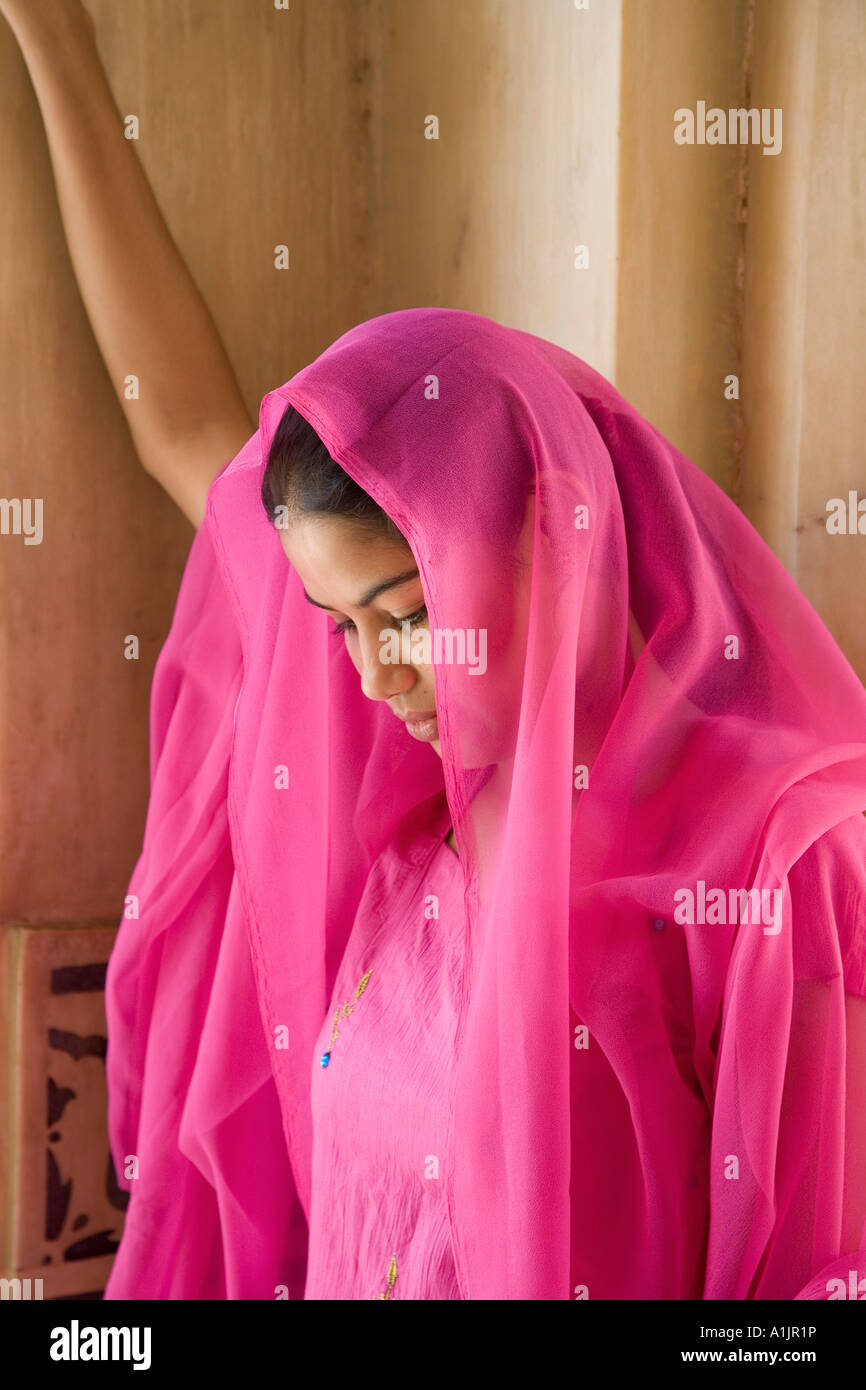Colorful Hindu woman at Amber Fort temple in Rajasthan Jaipur India ...