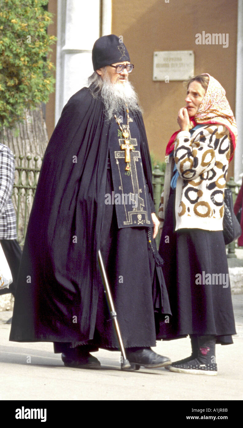 Eastern orthodox monk, peasant woman, at The Trinity Lavra of St ...
